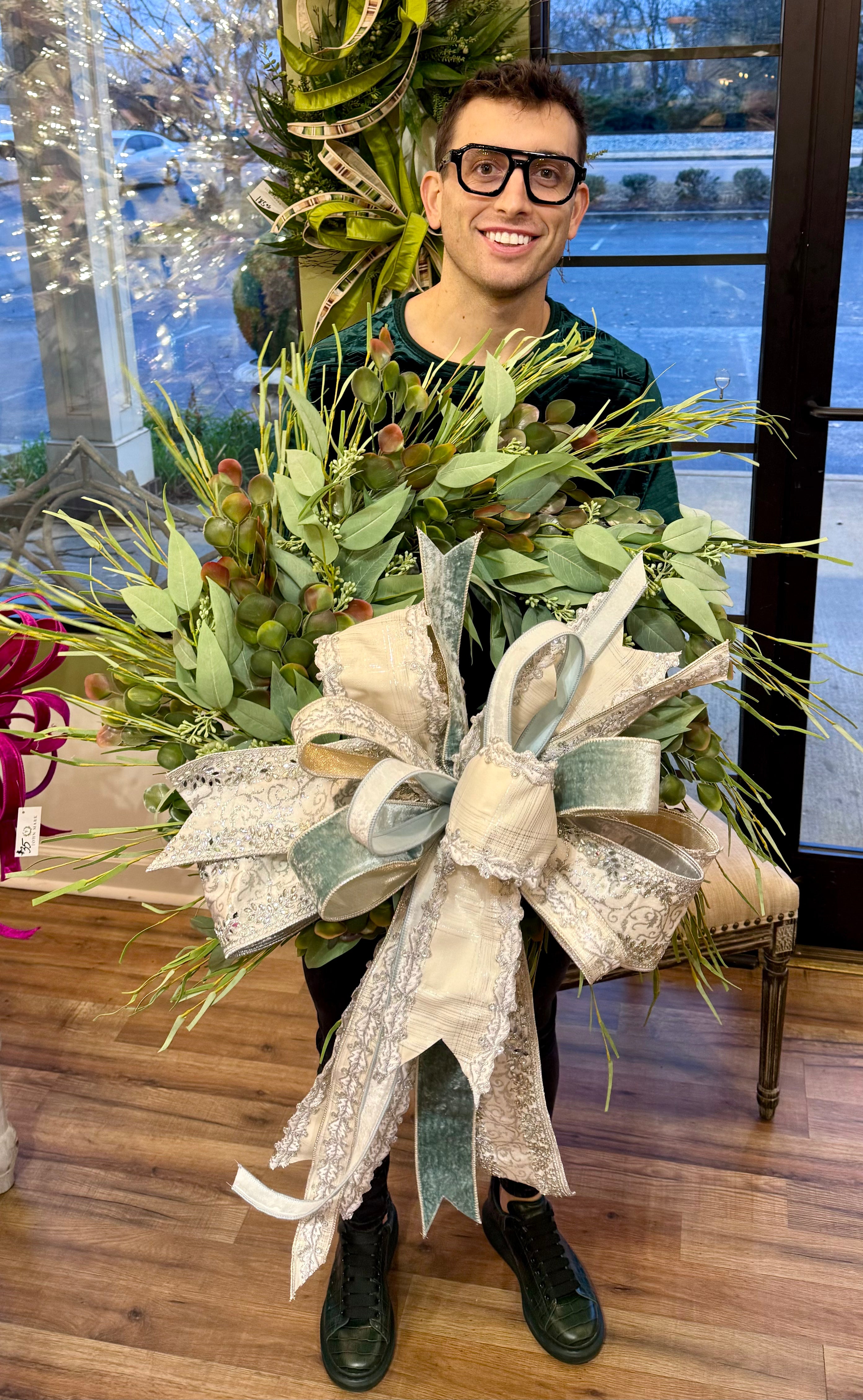 Faux Grass and eucalyptus wreath. Handmade by JME with a hand tied JM – John Mark's